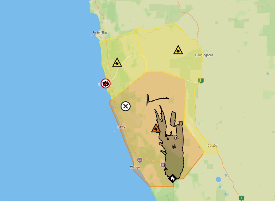 Wedge Island shacks unharmed as firefighters battle changing winds ...