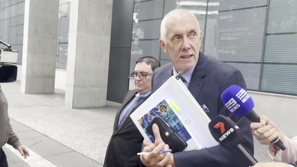 Michael Slater's lawyer Greg McGuire leaves court after the former test ...