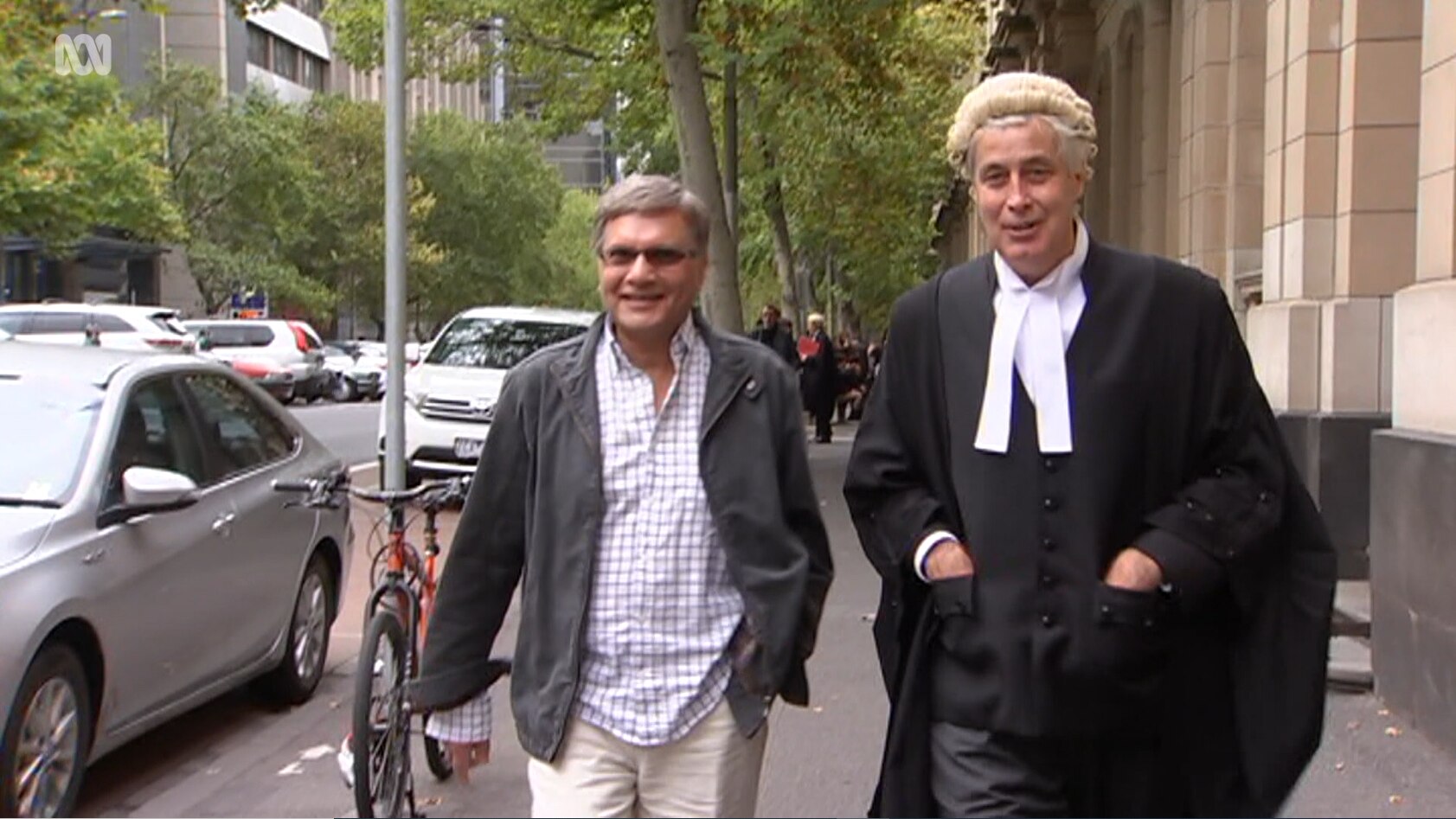 Peter Gant and Aman Siddique walking out of court after having their ...