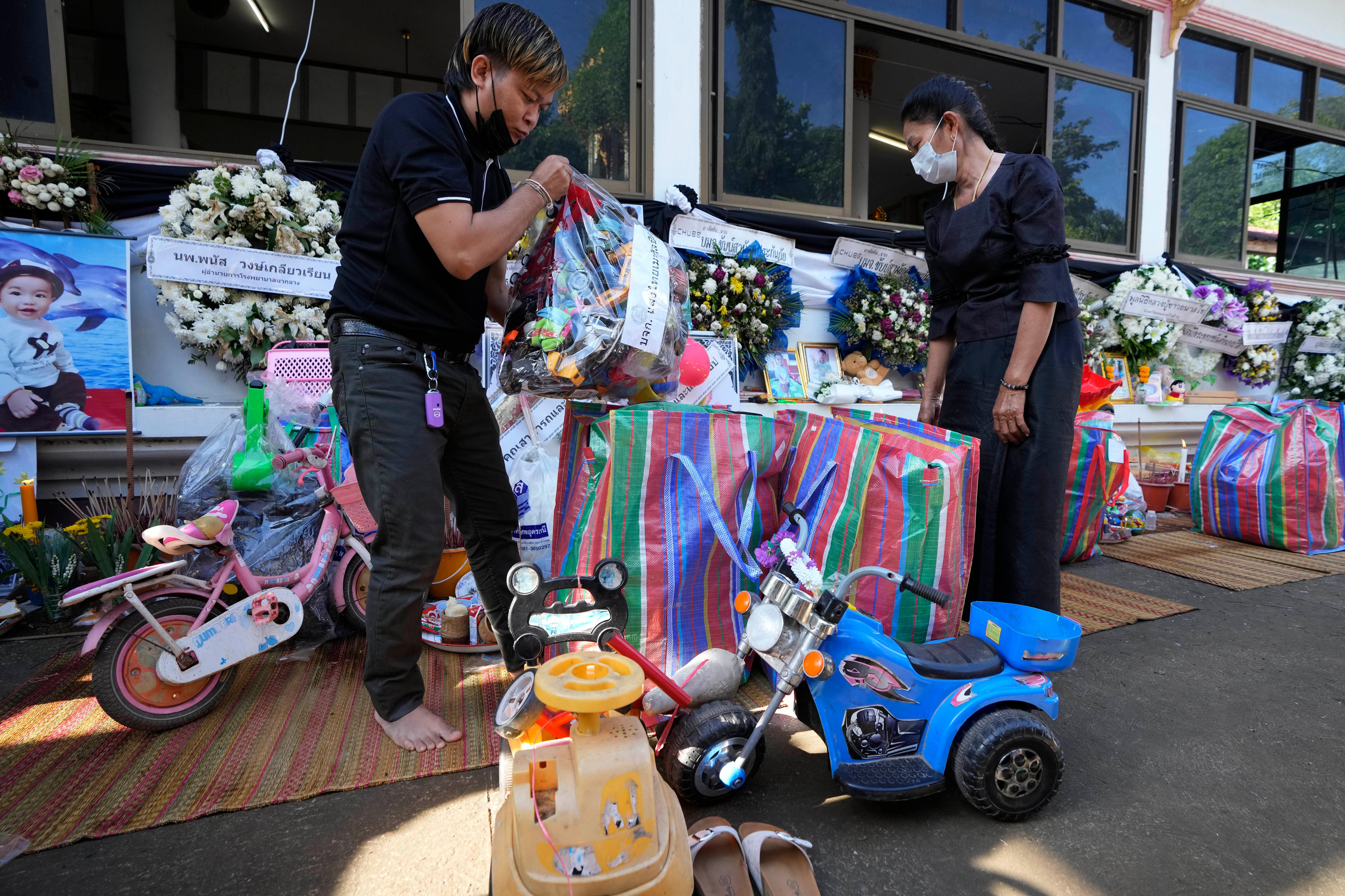 Thai childcare massacre victims cremated at three temples in Uthai ...