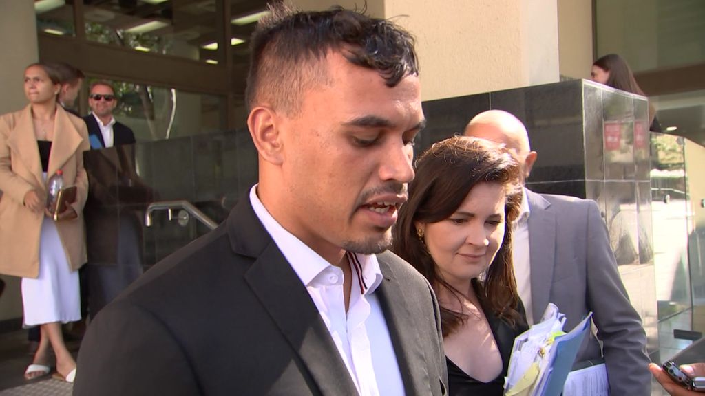 Richmond AFL player Sydney Stack speaking outside court - ABC News