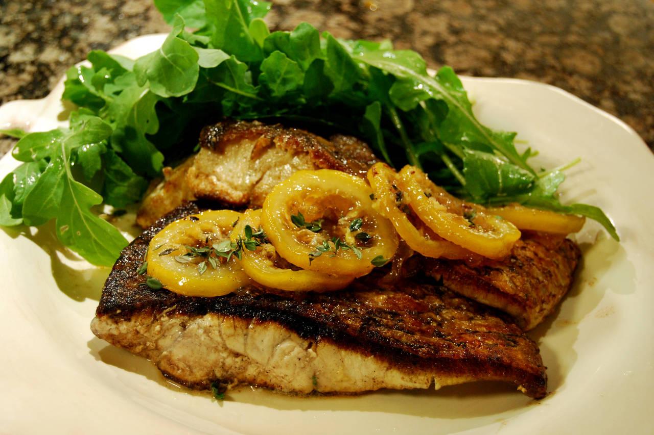 Pan roasted salt water barramundi with caramelised lemon & rocket - ABC ...