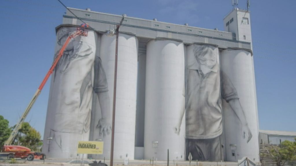 Children immortalised on giant silos - ABC News