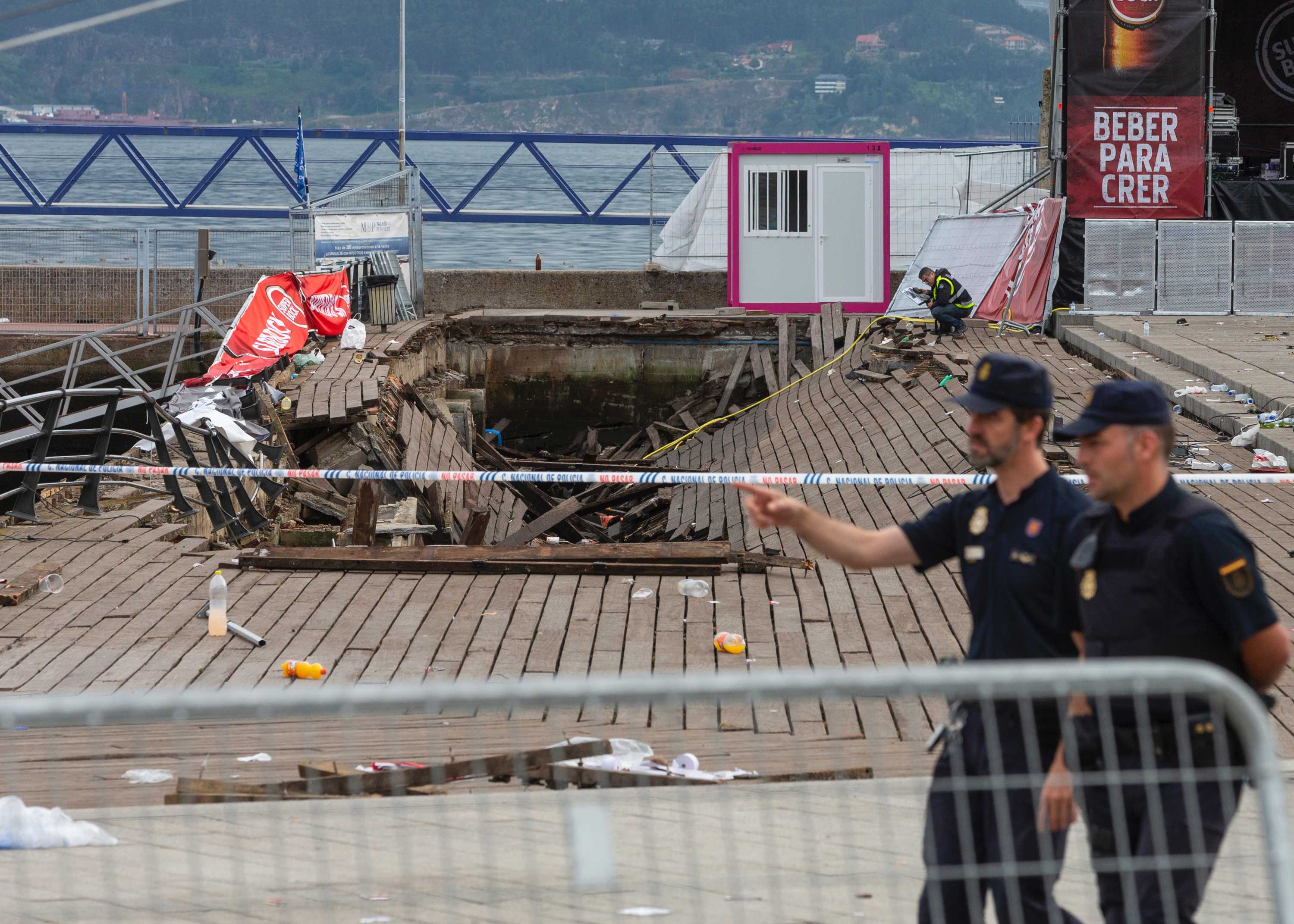 Wooden boardwalk collapses during seaside concert in Spain, injuring ...