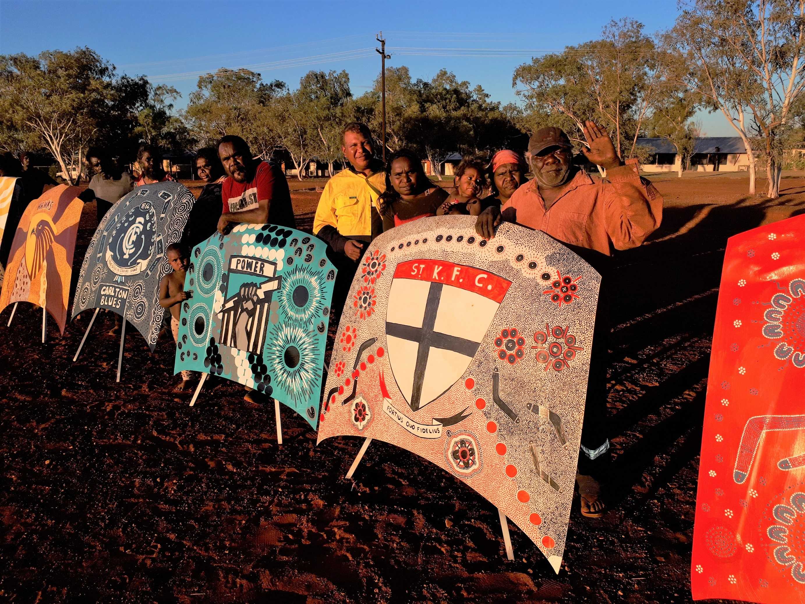 Balgo's remote artists hope footy-themed bonnet art can transform ...