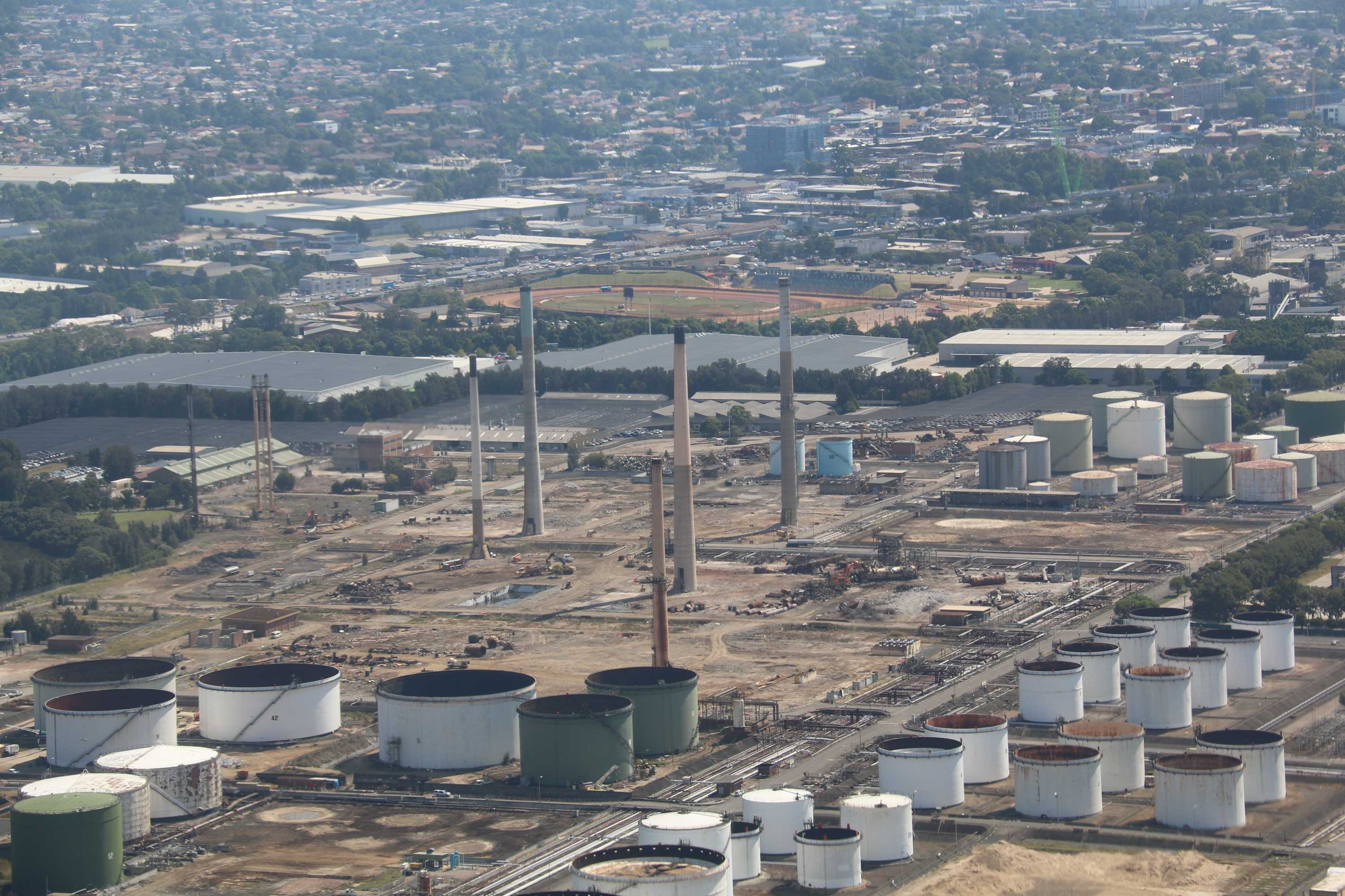 Fifth chimney stack at Sydney's old Clyde refinery brought down after ...