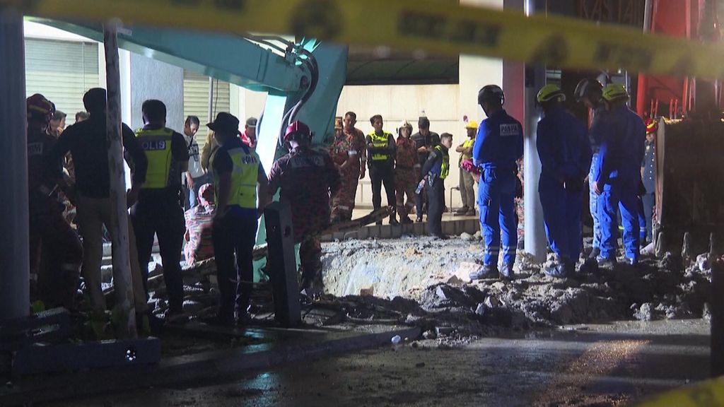 Woman falls into deep hole after pavement sinks in Malaysia - ABC News