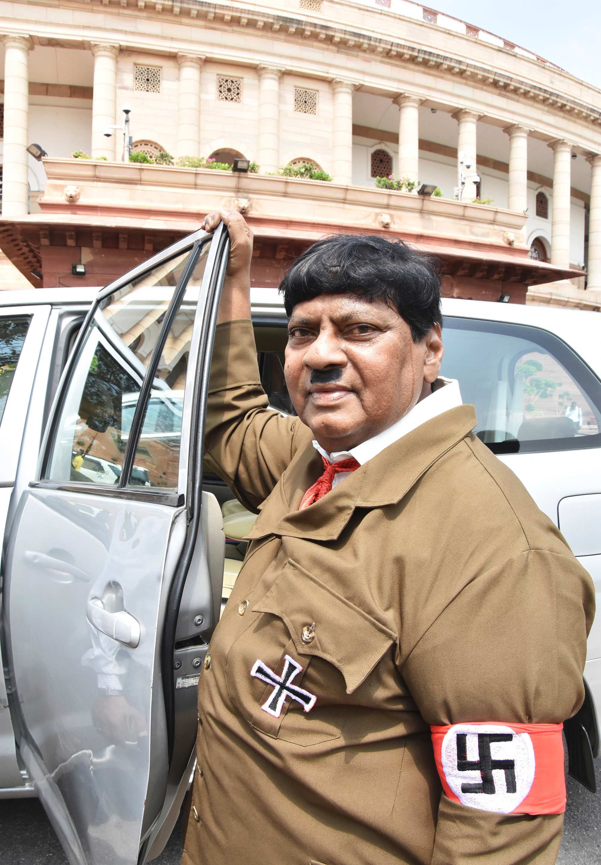 Indian politician dresses as Hitler to demand funds for his state from ...