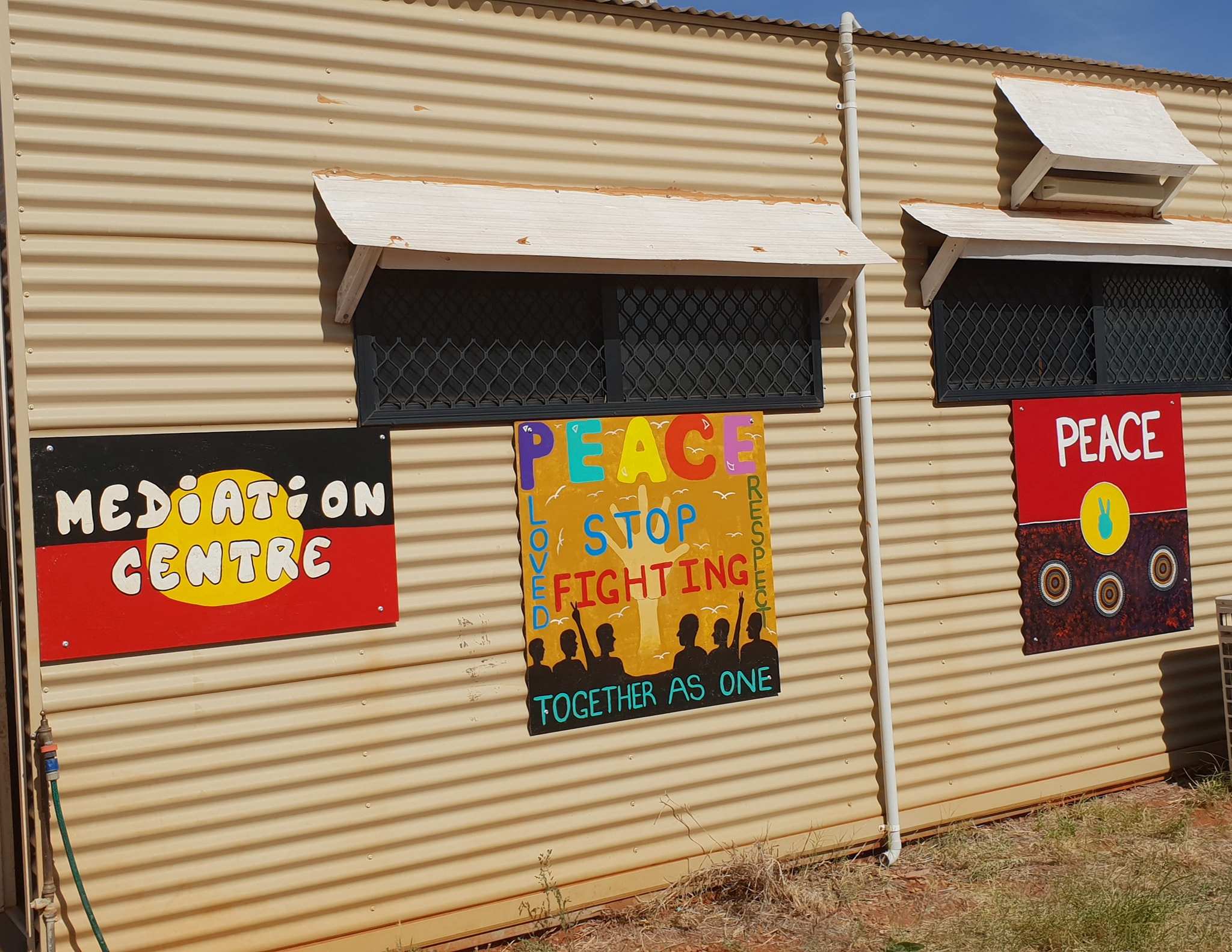 Signs of peace and community healing emerge from the dust of a violent ...