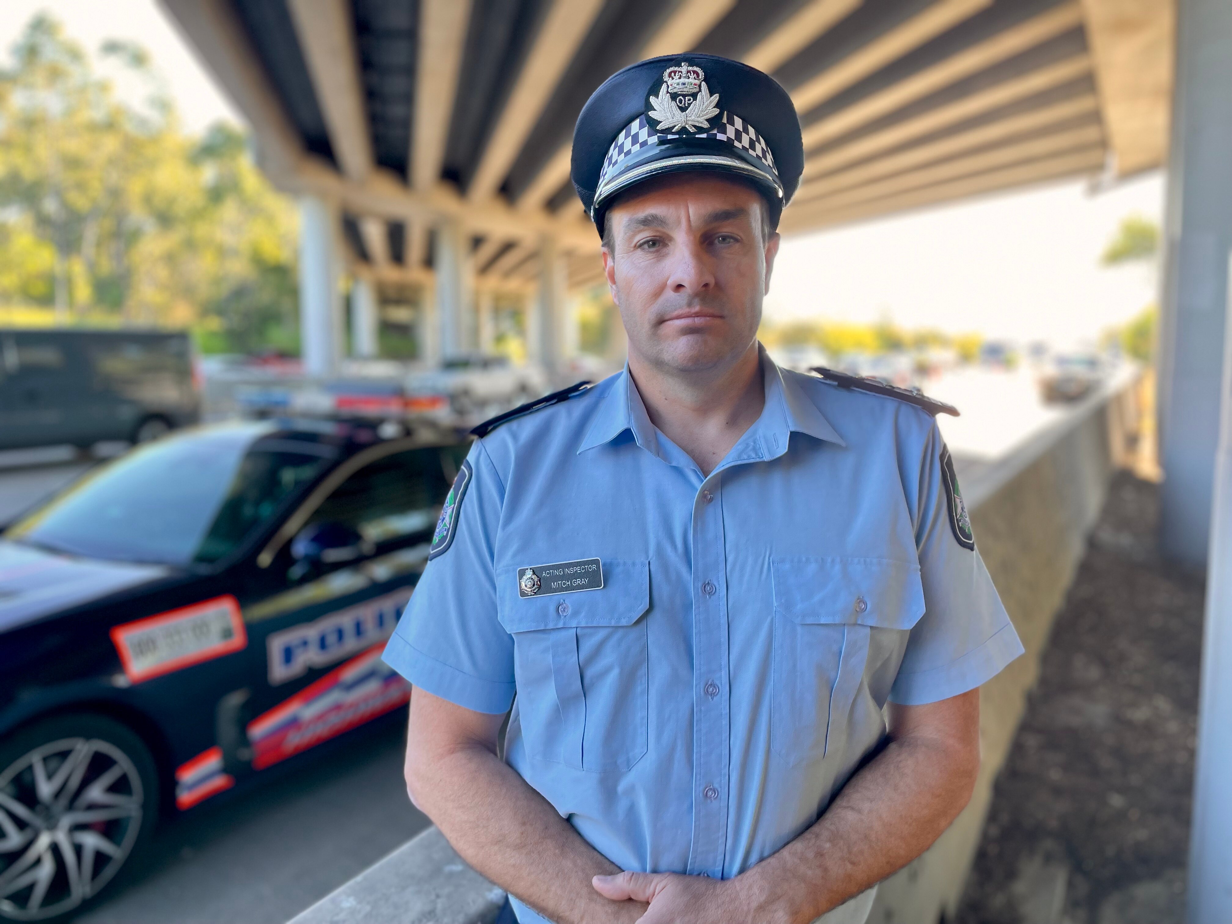 Firefighters cut patients out of crash after parked police car hit at ...