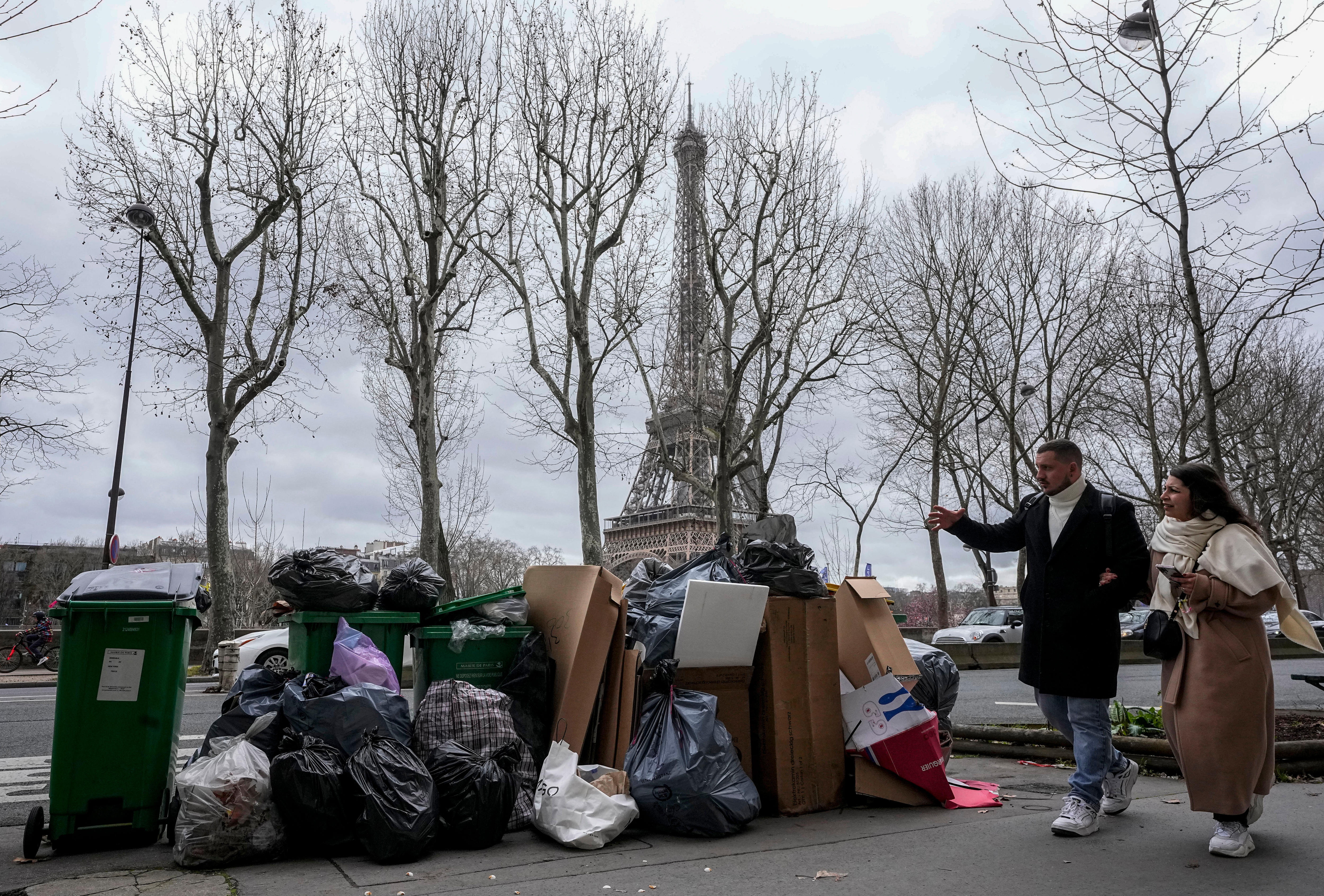 Paris garbage collectors protest against President Emmanuel Macron's ...