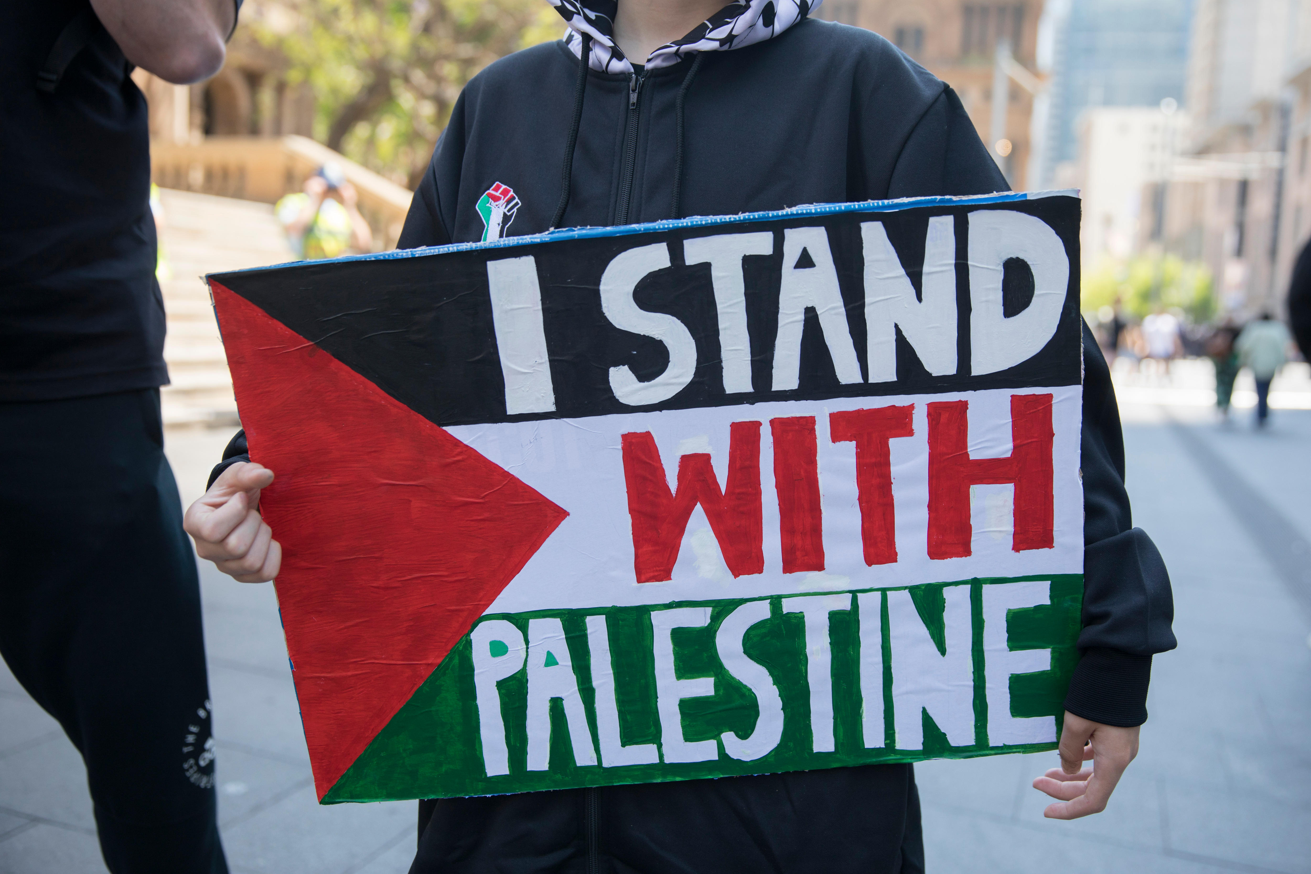 Colours of Palestinian flag fly over streets in Sydney, Brisbane and ...