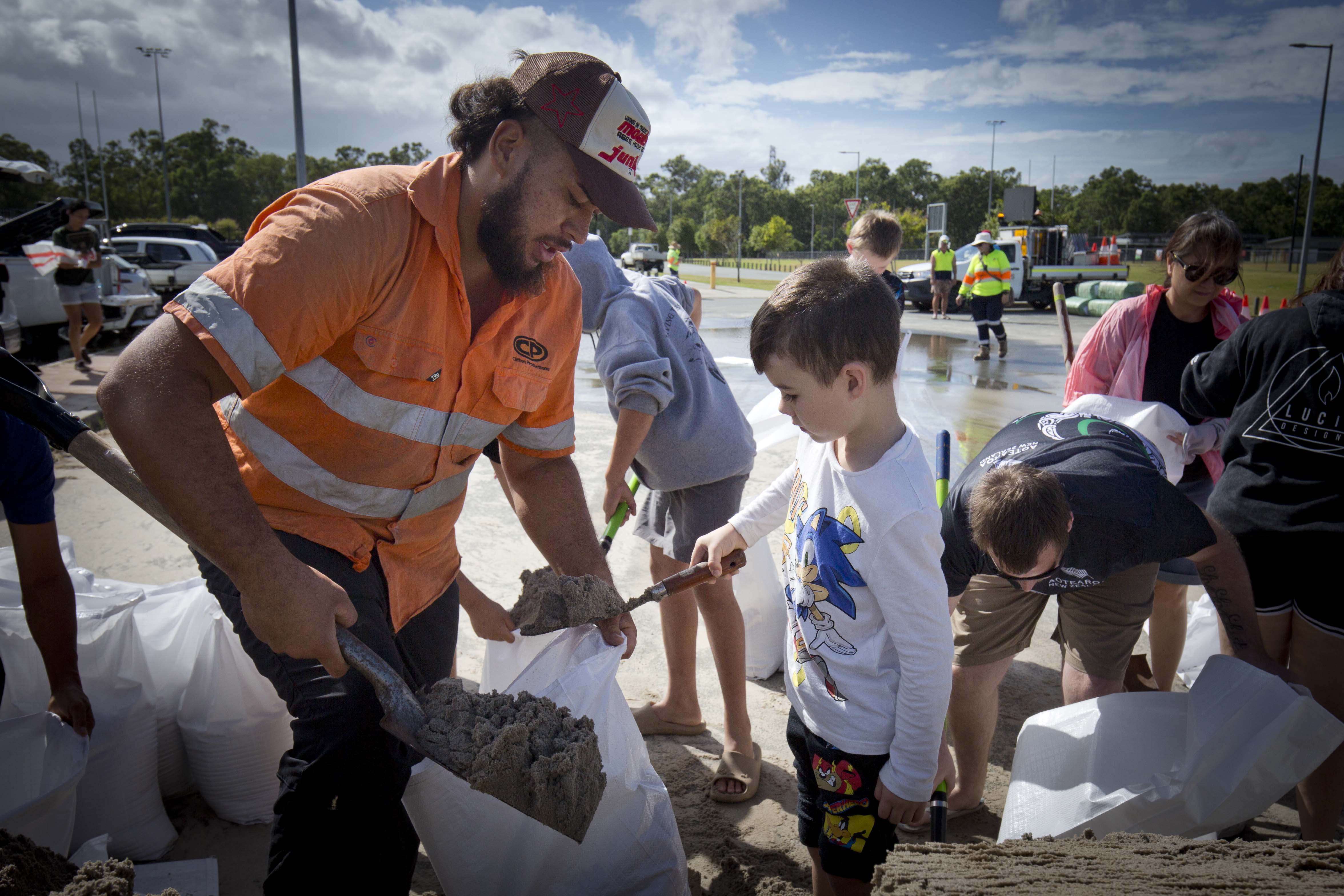 Logan community comes together to help each other ahead of Cyclone ...