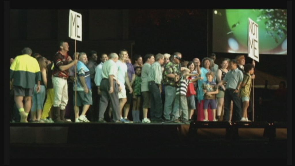Magistrate Peter Maley on stage at 100% Darwin, a performance featuring ...