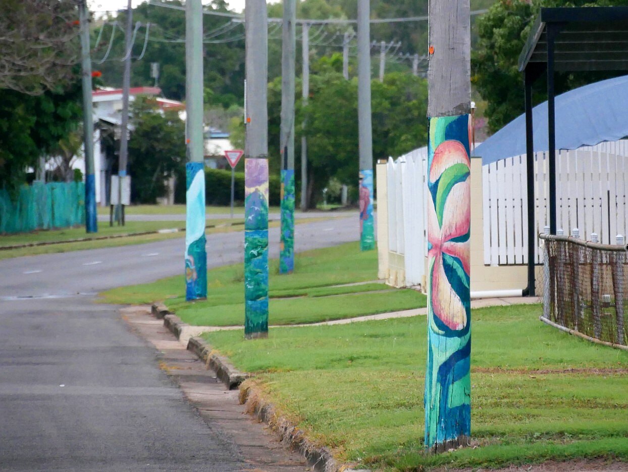 Painted power poles transform fishing town of Lucinda into public ...