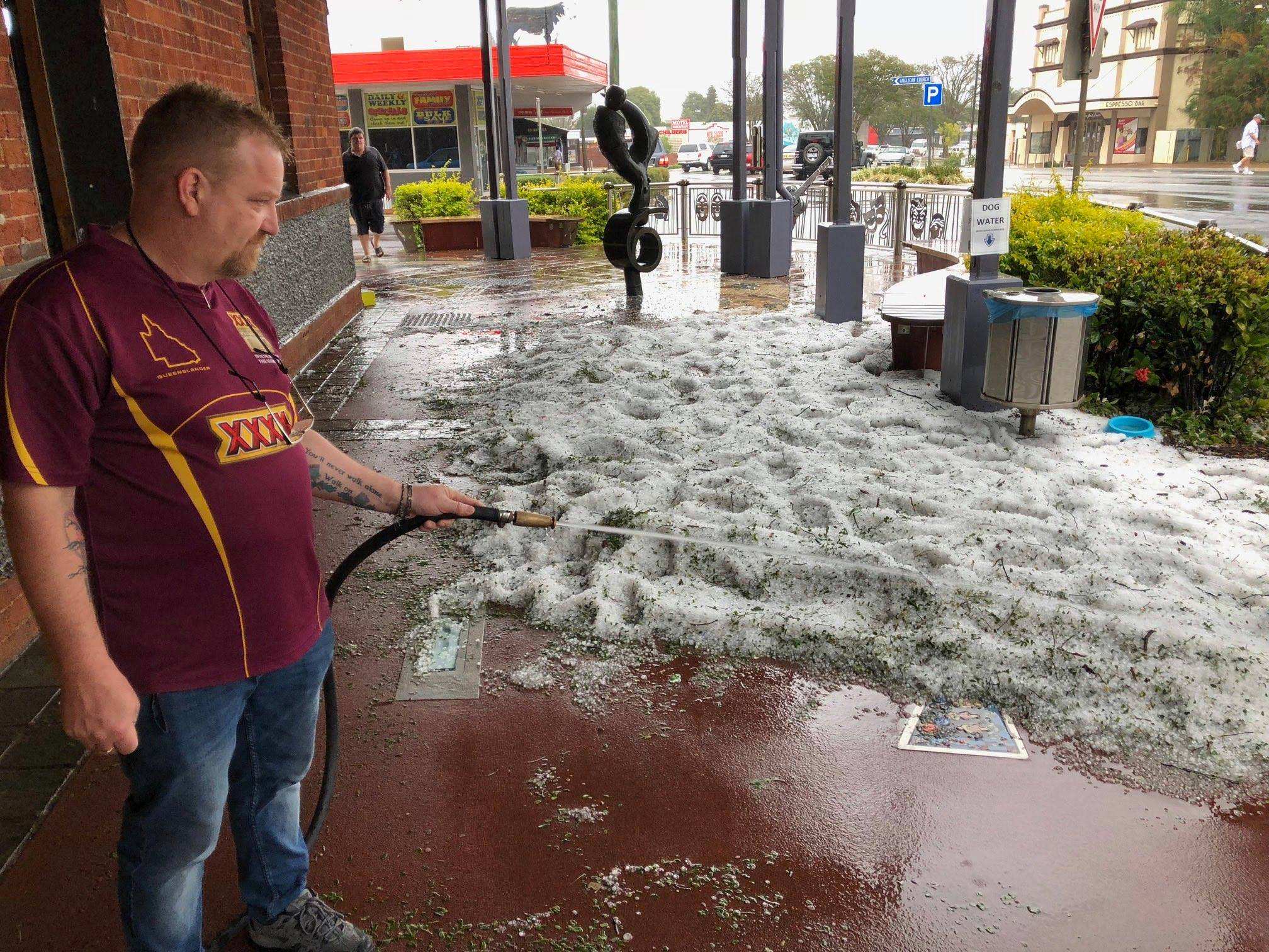 Hail storm rips roof from building, brings down trees and powerlines in ...