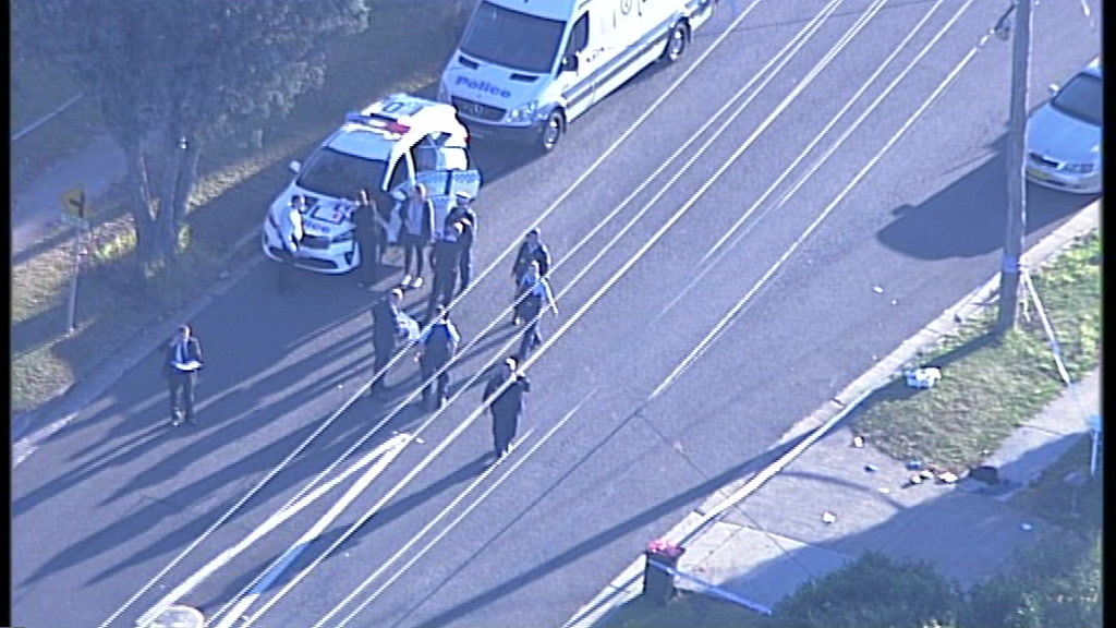 Police lock down a house in south-west Sydney - ABC News