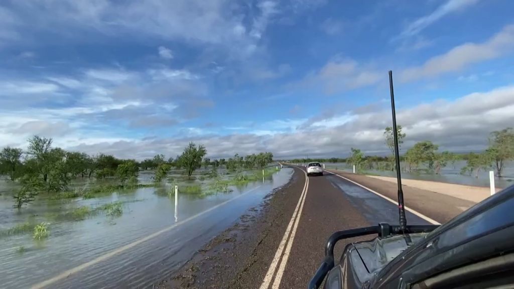 Deluge continues in north Queensland with towns on flood watch after ...