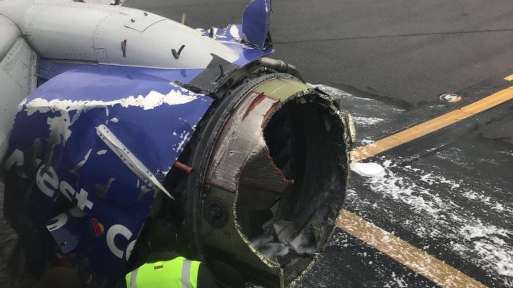 Passengers grabbed woman sucked out of plane window in deadly explosion ...