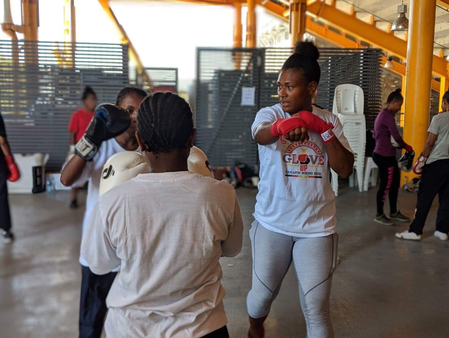 Champion boxer beaten by ex-partner with hot iron raises profile of ...