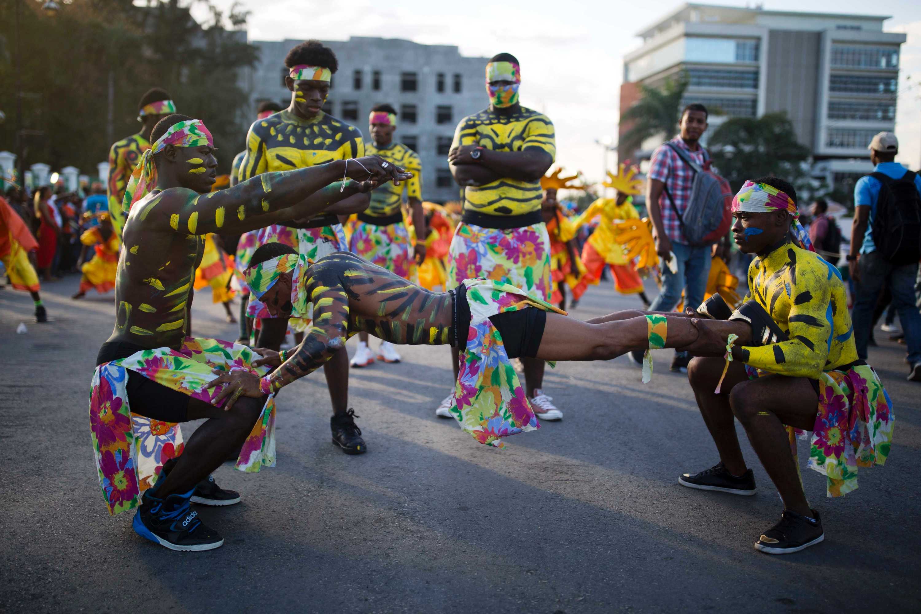 In photos: From Brazil to Haiti, revellers around the world celebrate ...
