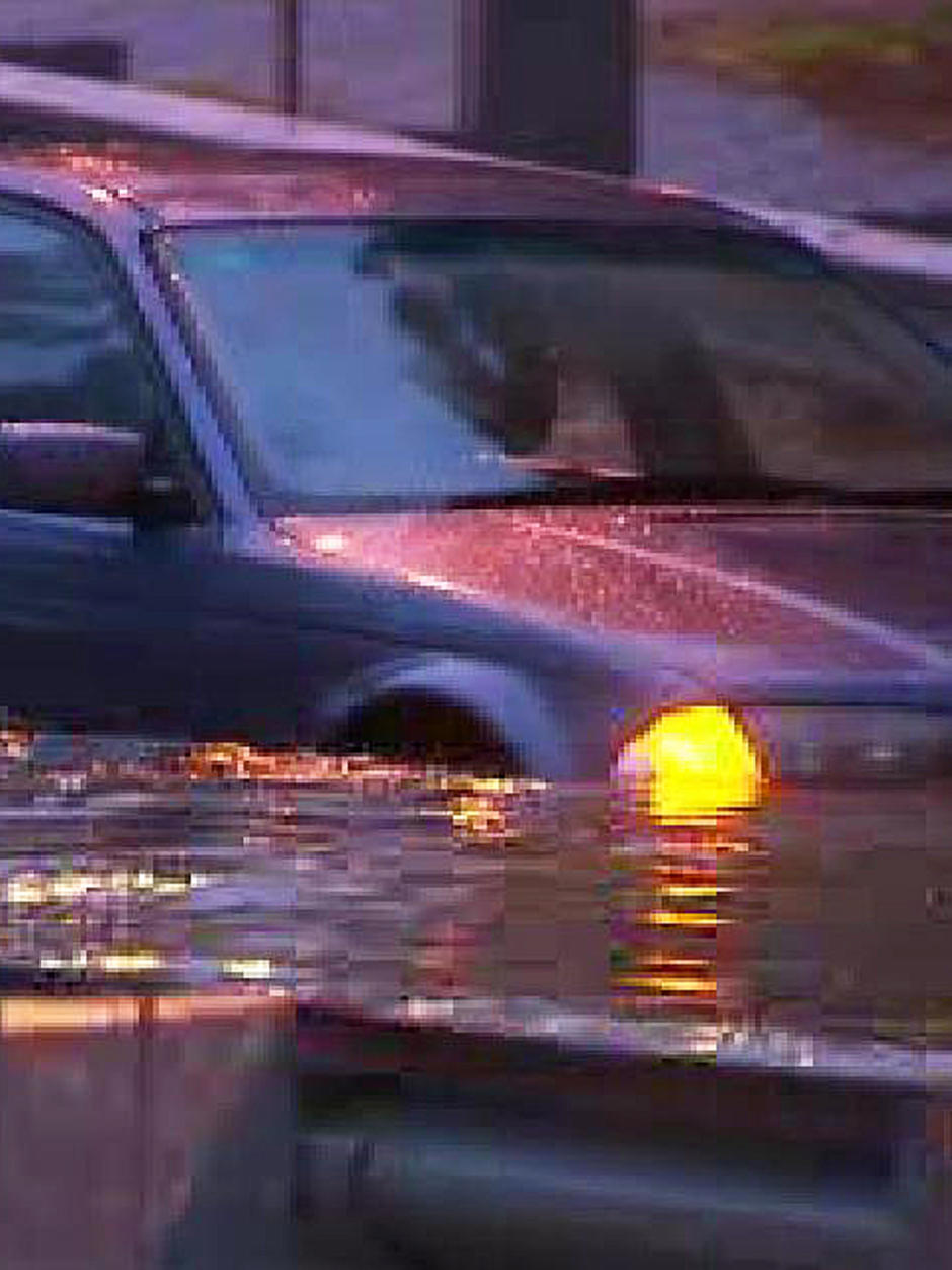 Man rescued from car in creek - ABC News