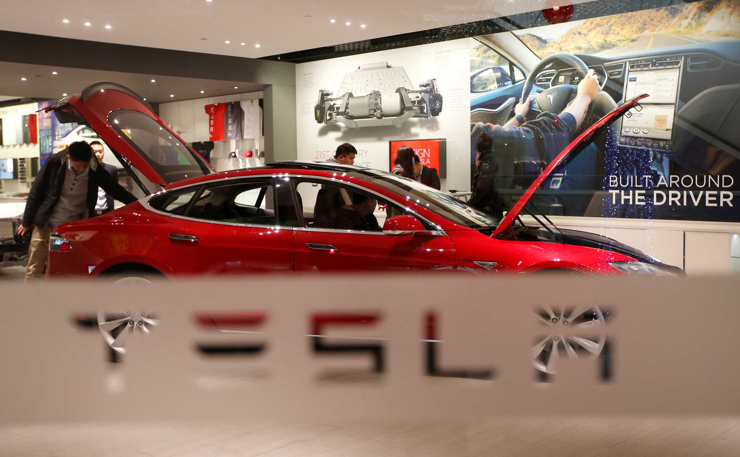 Tesla Model S car hacked by Chinese security firm from 19km away using ...