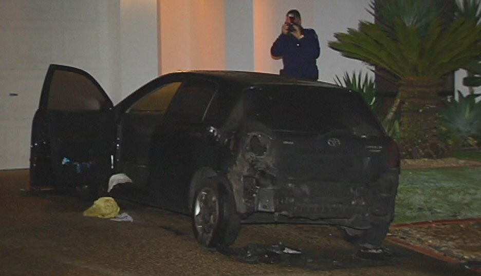 Cat decapitated, car torched, message scrawled on garage door at Gold ...