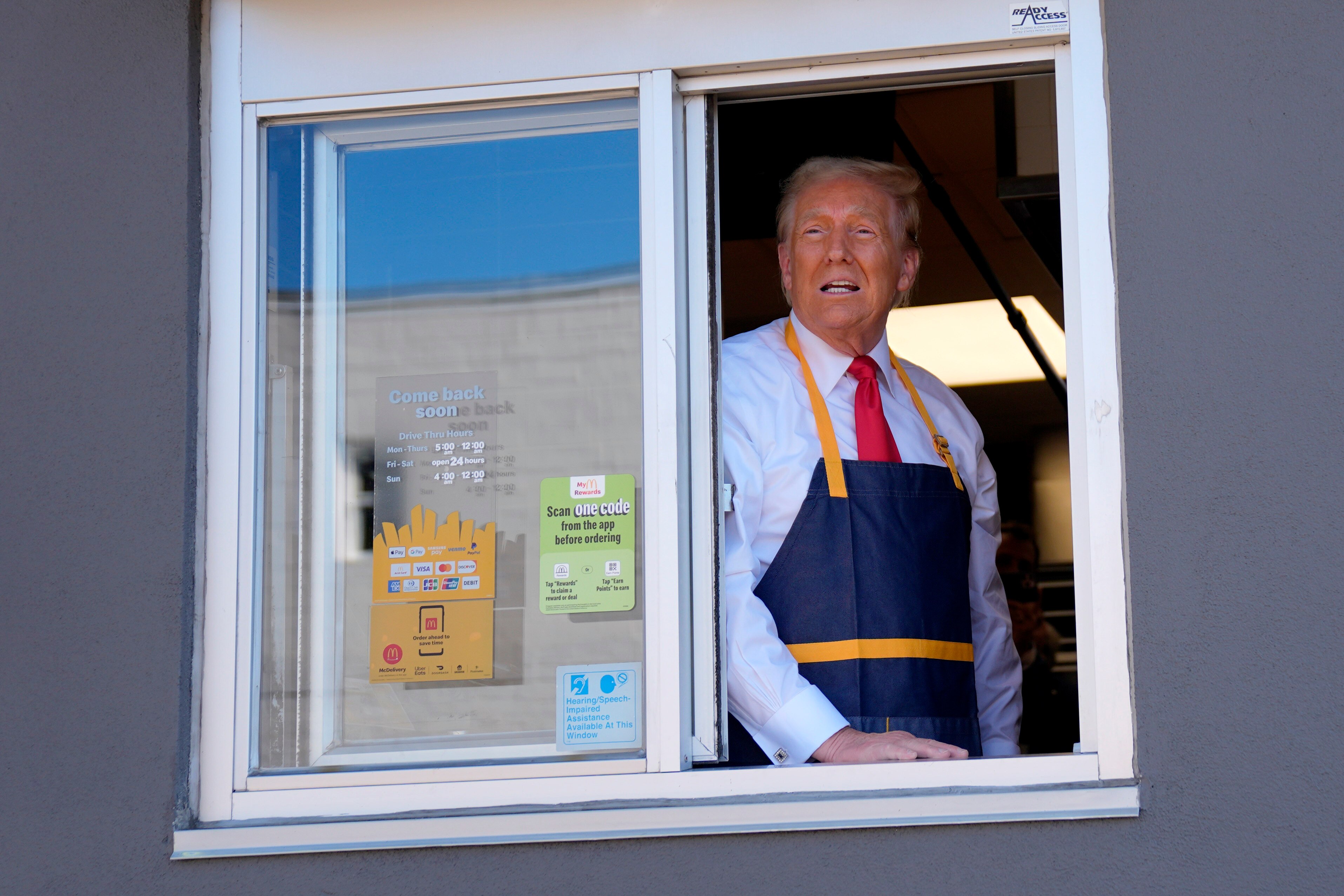 Donald Trump serves McDonald's fries in latest US election campaign ...