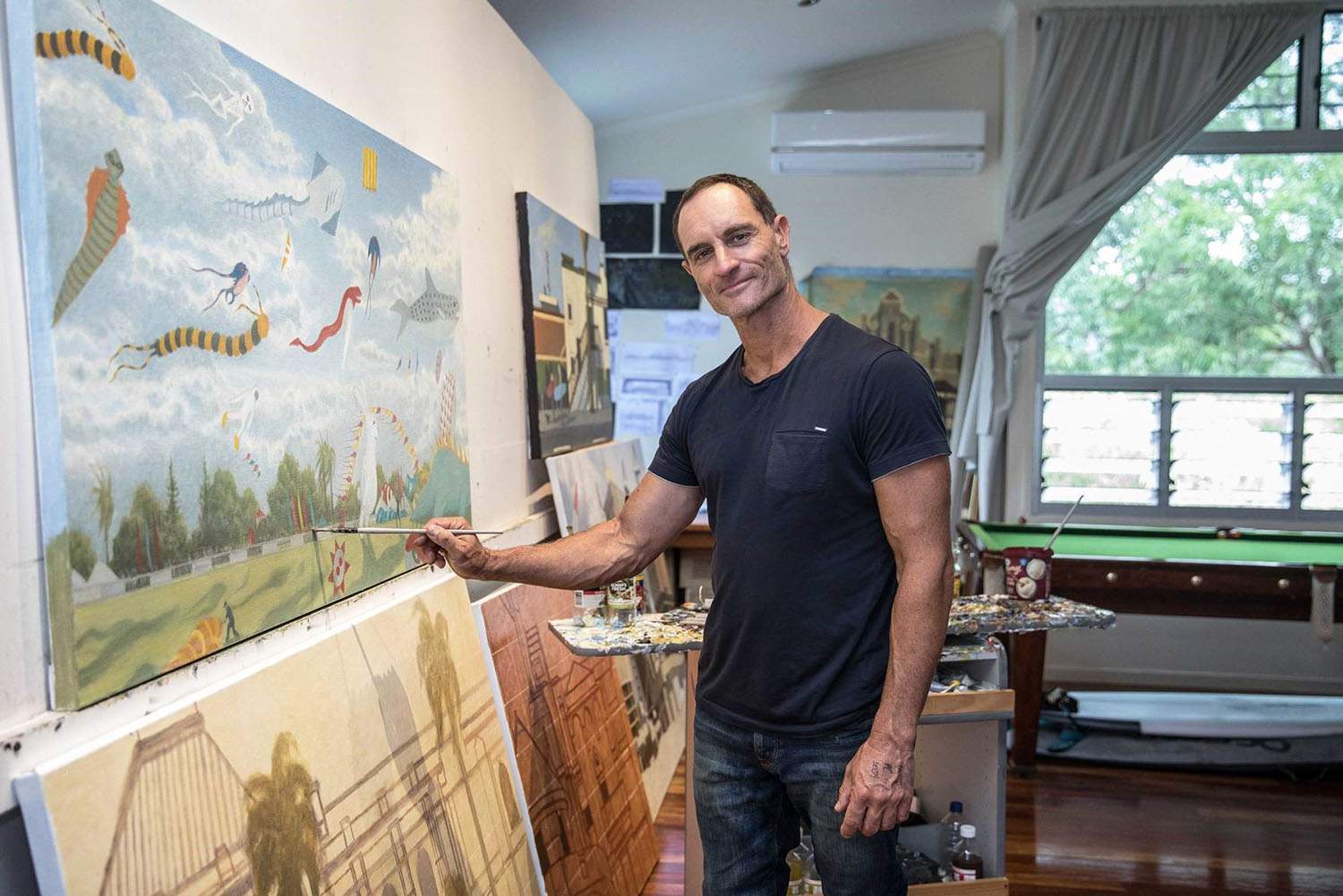 Acclaimed artist reunited with the man who saved him from nearly ...