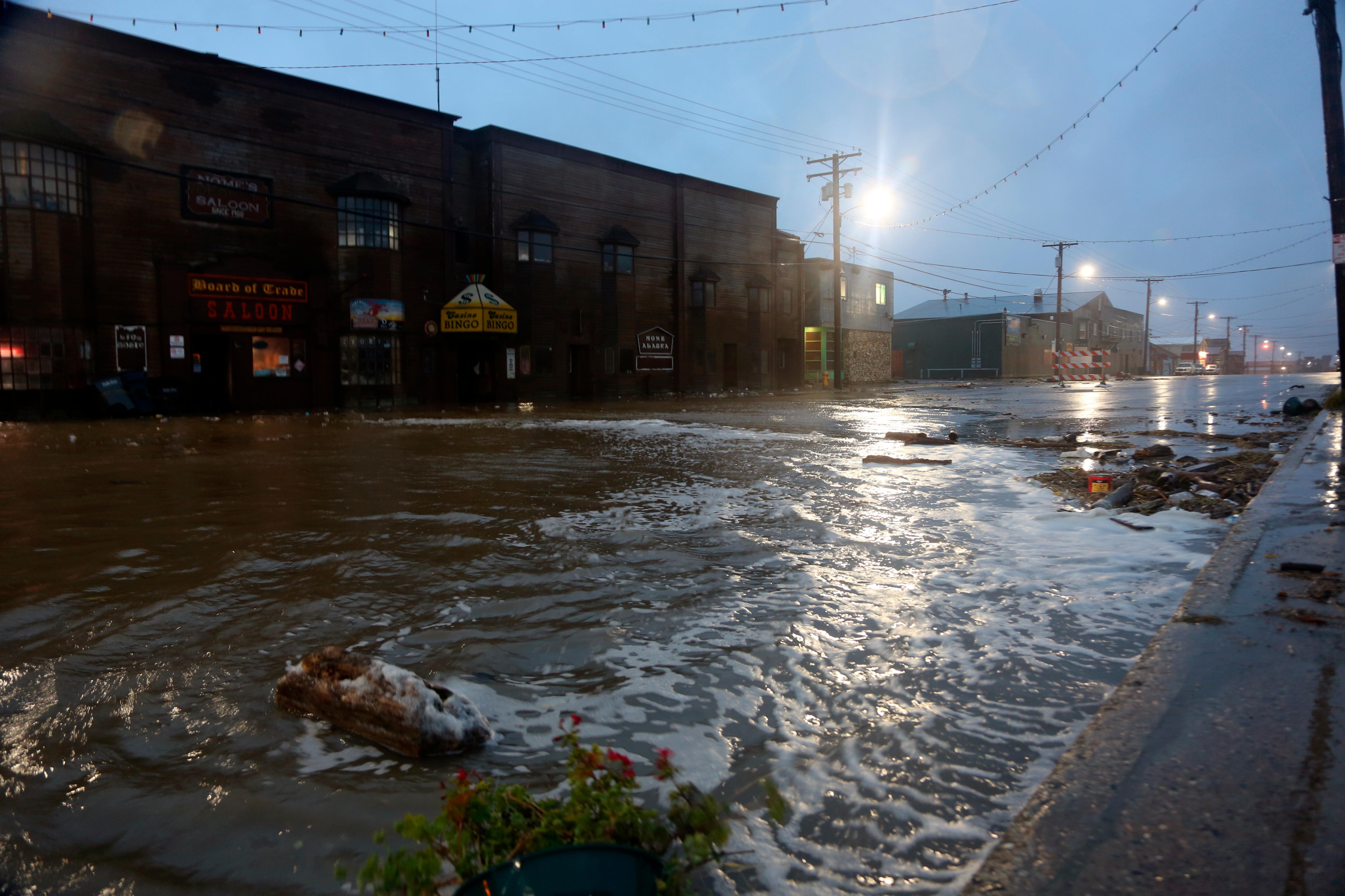 Storm battering western Alaska causes widespread flooding, homes moved ...