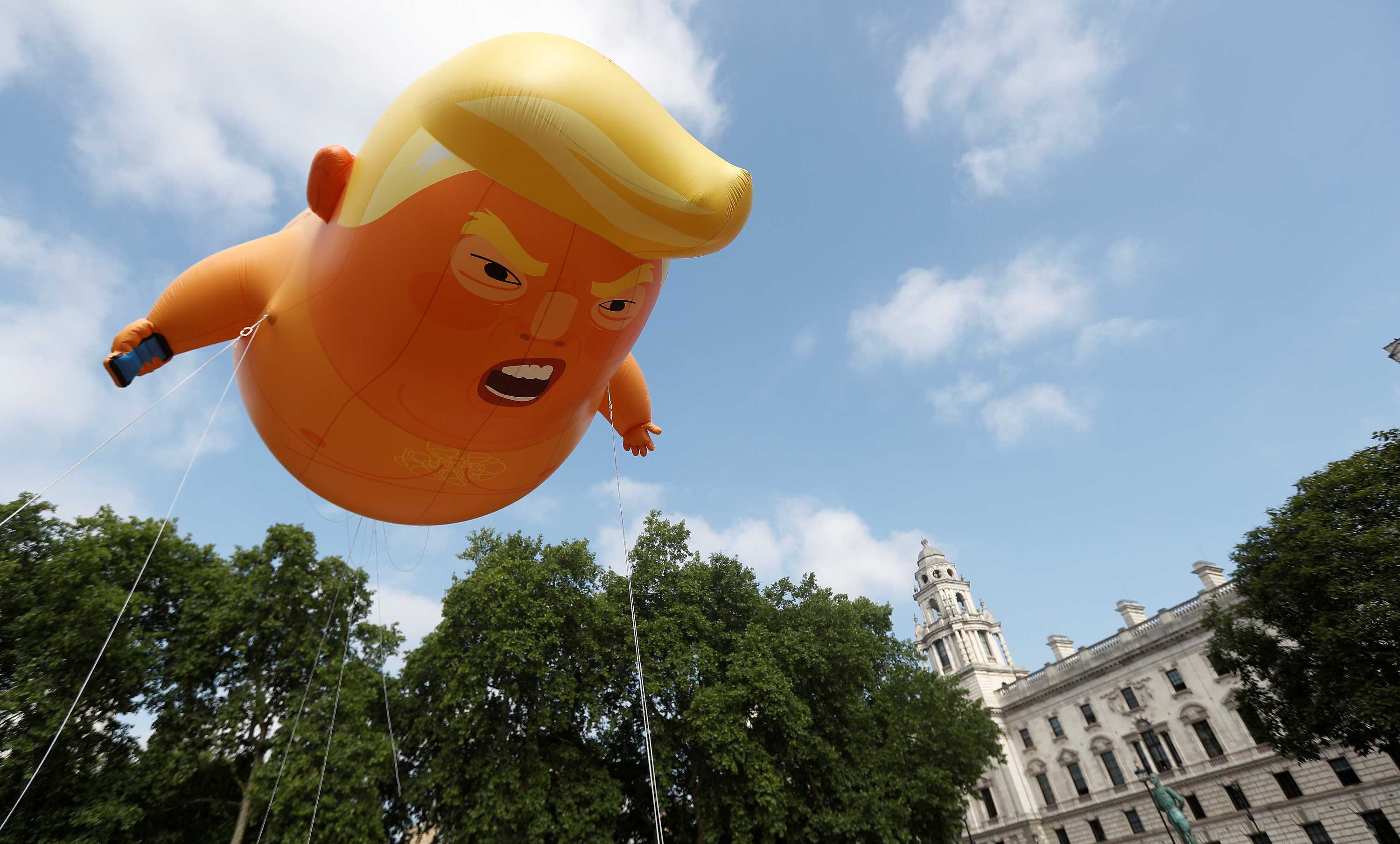 'Trump Baby' balloon takes flight in London as Donald Trump prepares ...