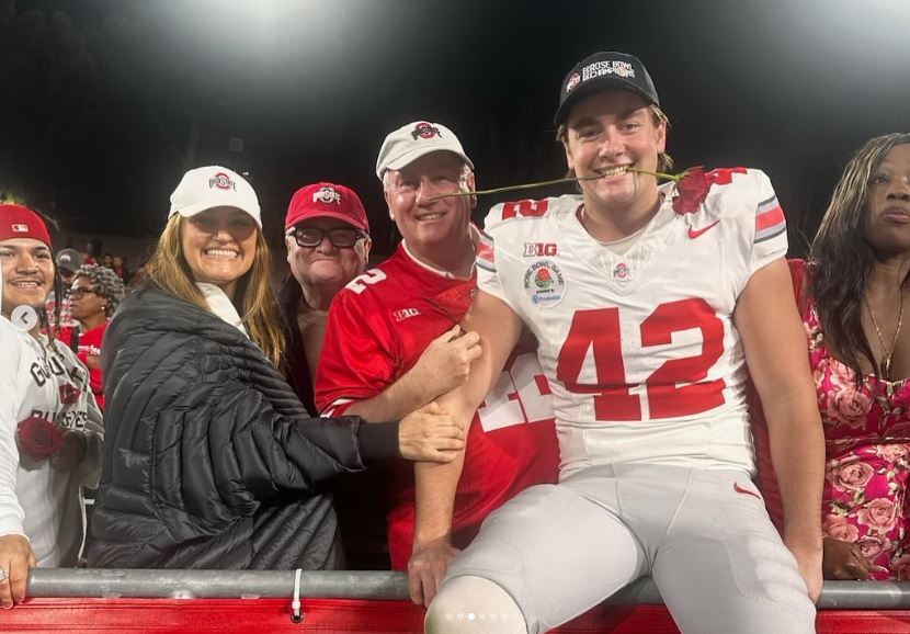 Joe McGuire shares shoey's with Americans to celebrate football win ...