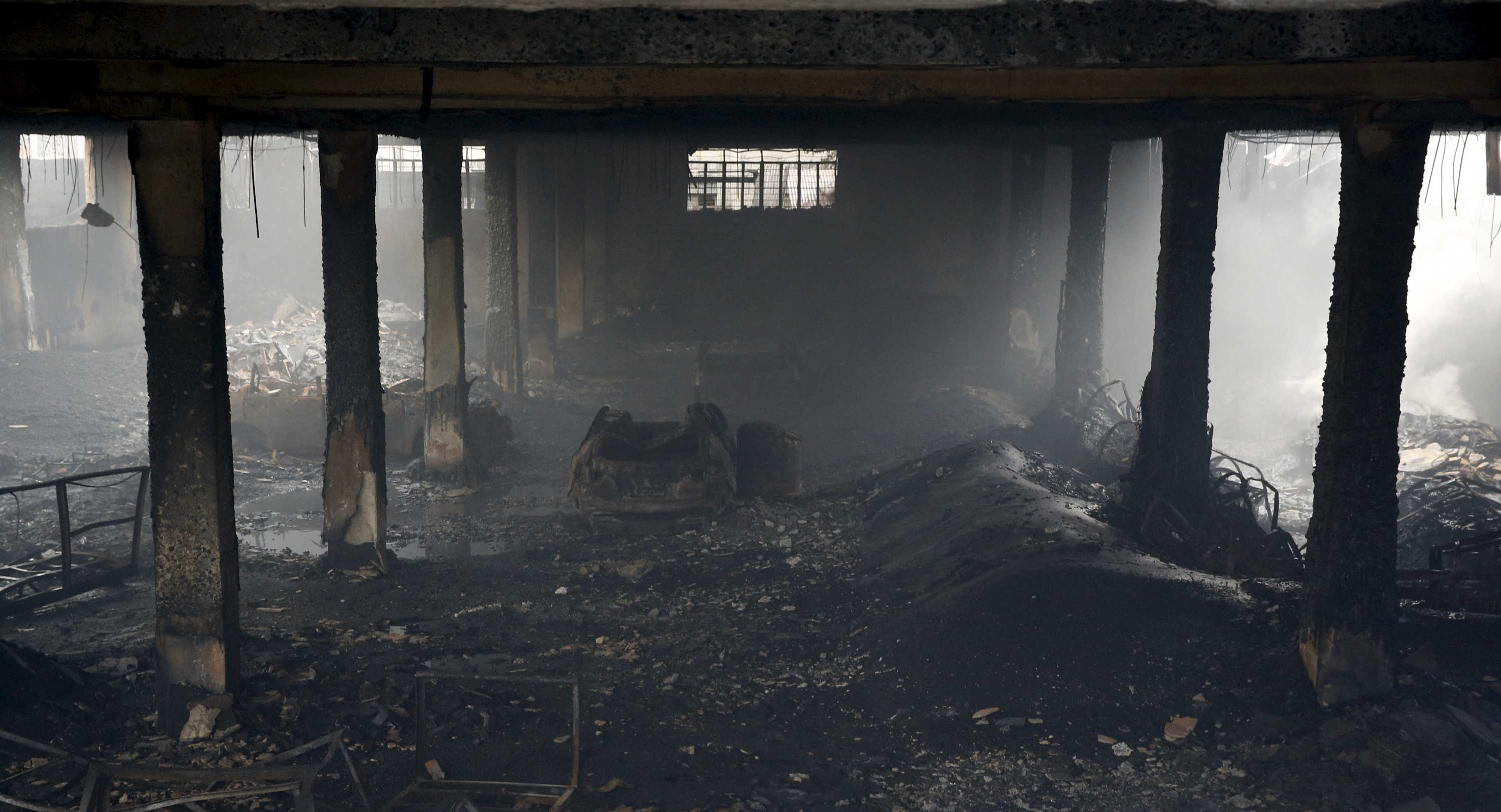 Death toll from Philippine factory fire revised up to 72, officials say ...