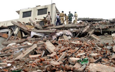 Building collapse in Bangladesh traps hundreds - ABC News