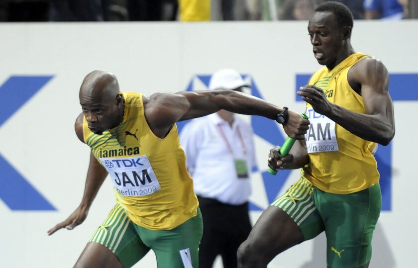 Triple gold for Bolt in Berlin - ABC News