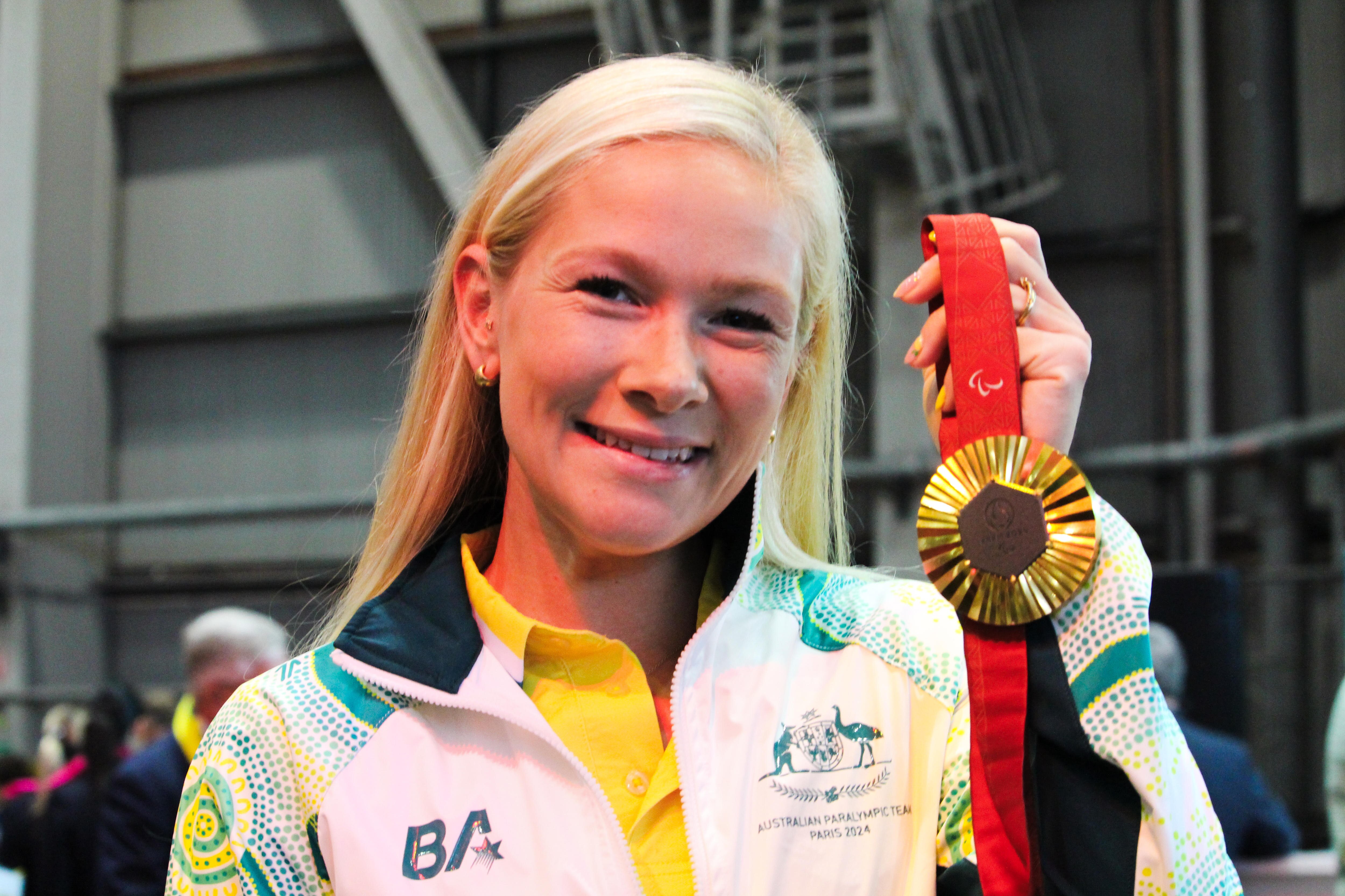Australian Paralympic team arrives in Sydney after winning 63 medals at ...