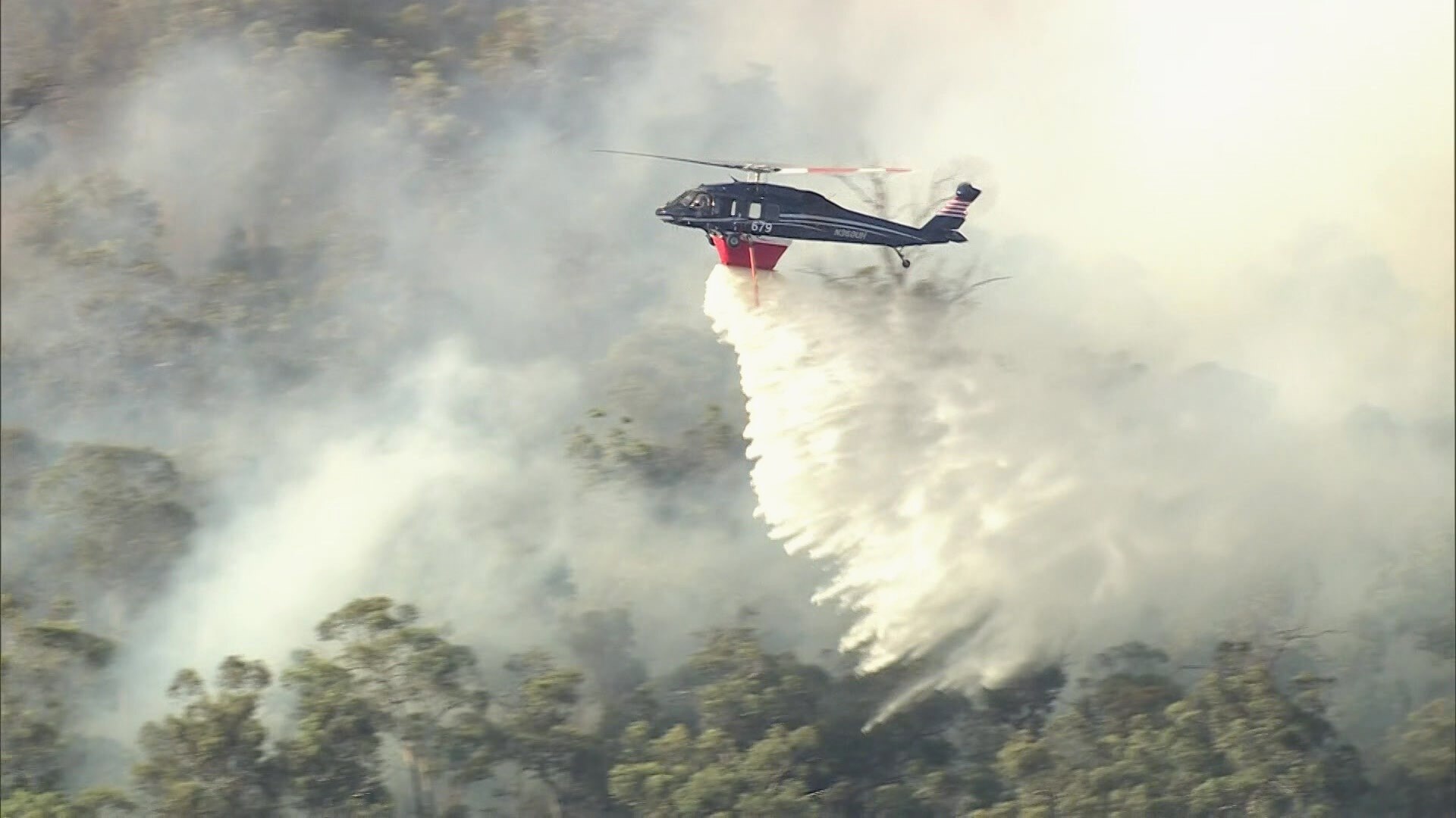 Bushfire emergency warning lifted after blaze engulfs property near ...