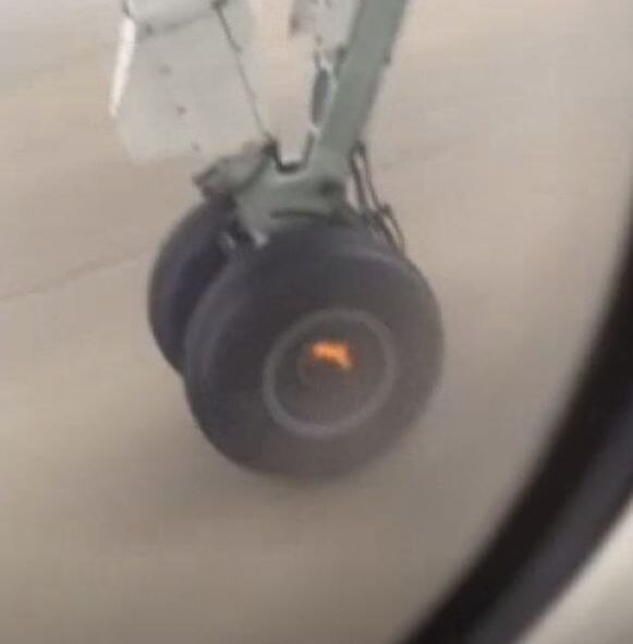 Video captures the moment a landing gear wheel falls off an Air Canada ...