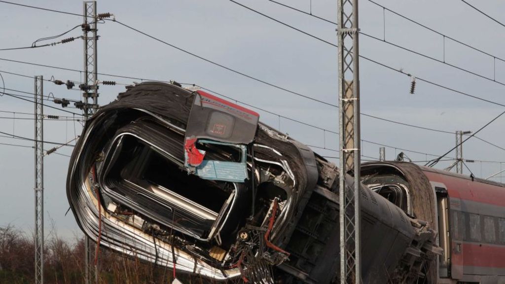 The engine carriage broke off the train and smashed into a building ...