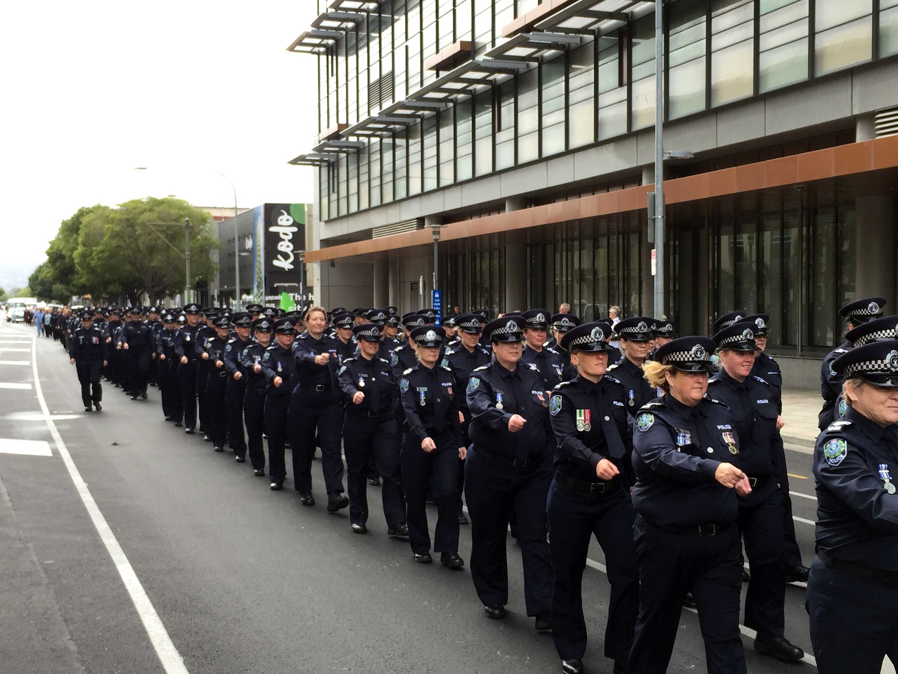Female officers march through Adelaide to mark 100 years of women in SA ...