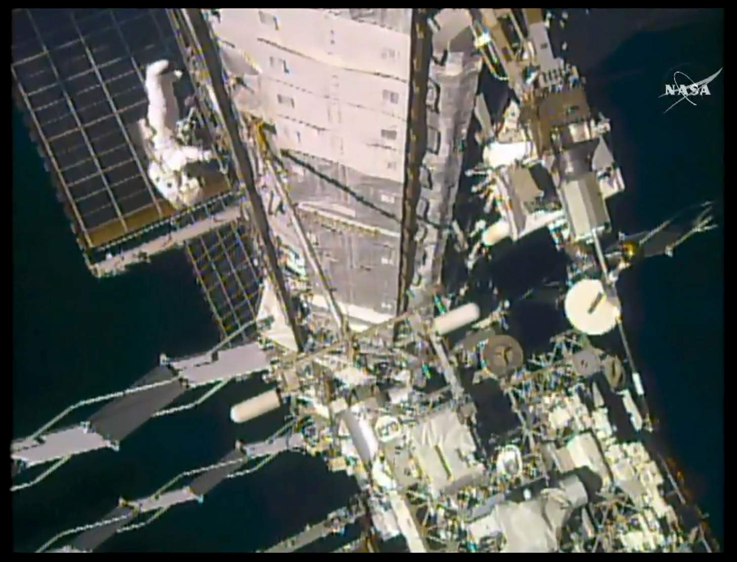 US astronauts dodge ammonia flakes during risky spacewalk to repair ...