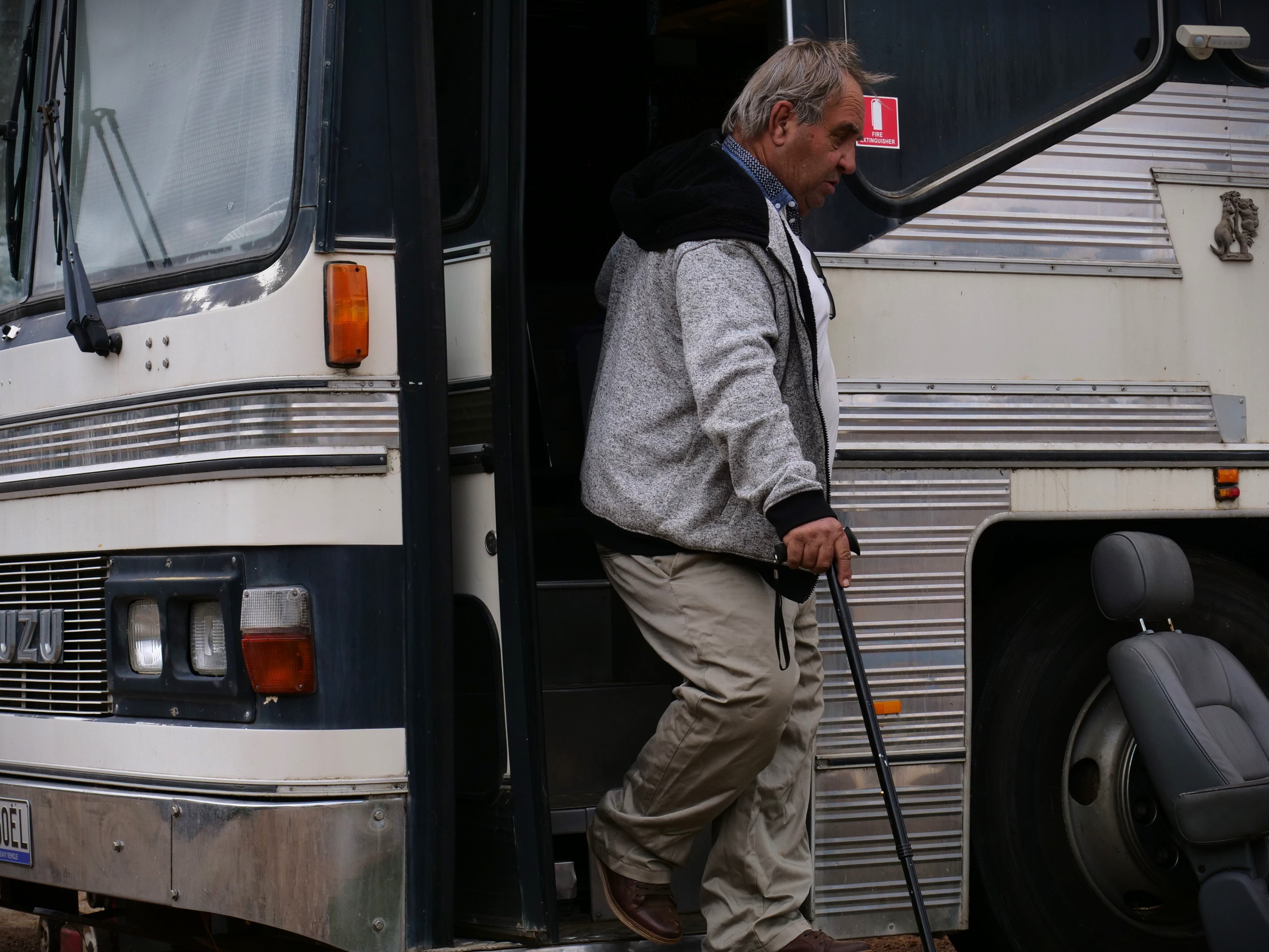 Pensioner living in bus on private land because he can't afford to buy ...