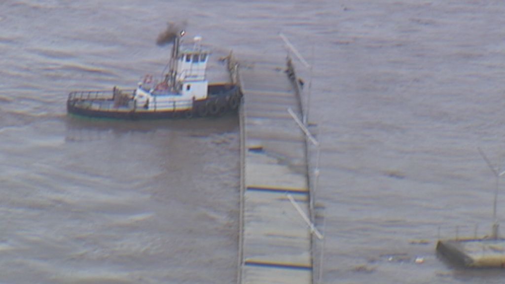 Archive: Hero tug boat drivers guide concrete walkway down flooded ...