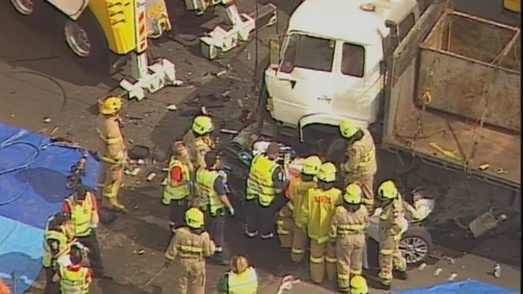 Point Cook crash: Crews free driver crushed under truck in Melbourne ...