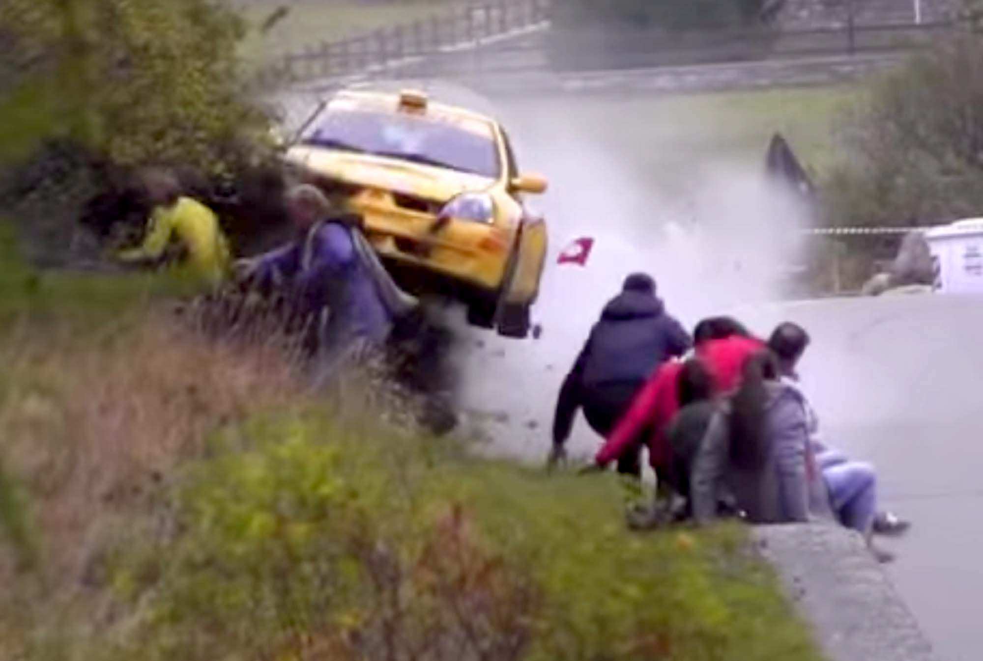 Spectators narrowly escape tumbling race car during Italy's Jolly Rally ...
