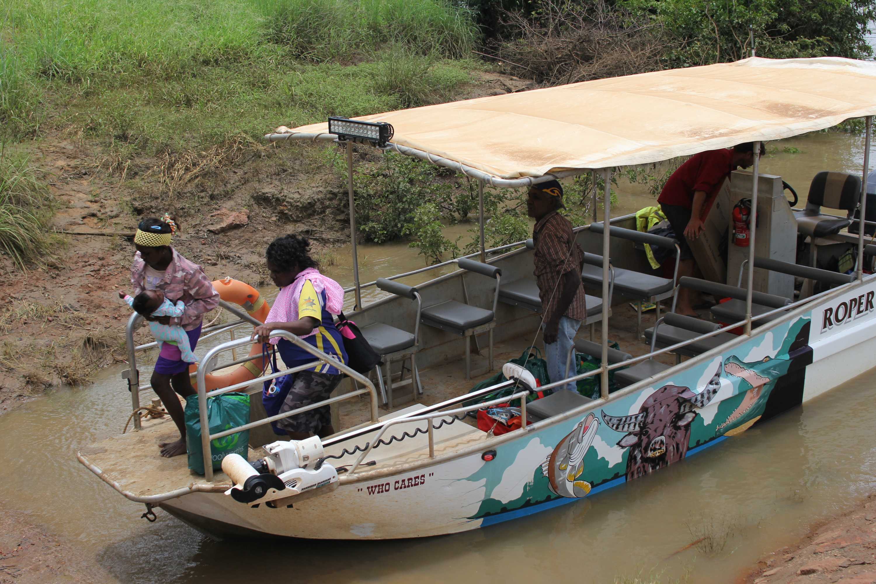 People, food and freight travel along the Roper River during wet season ...