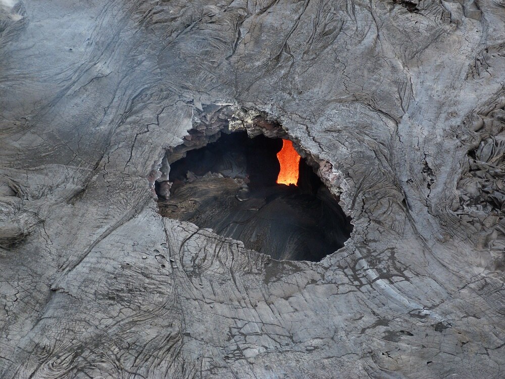 Man dies in Hawaii after falling into lava tube while trimming his ...