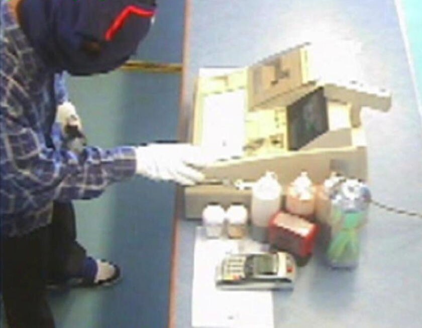 Security camera image released of alleged armed robber - ABC News