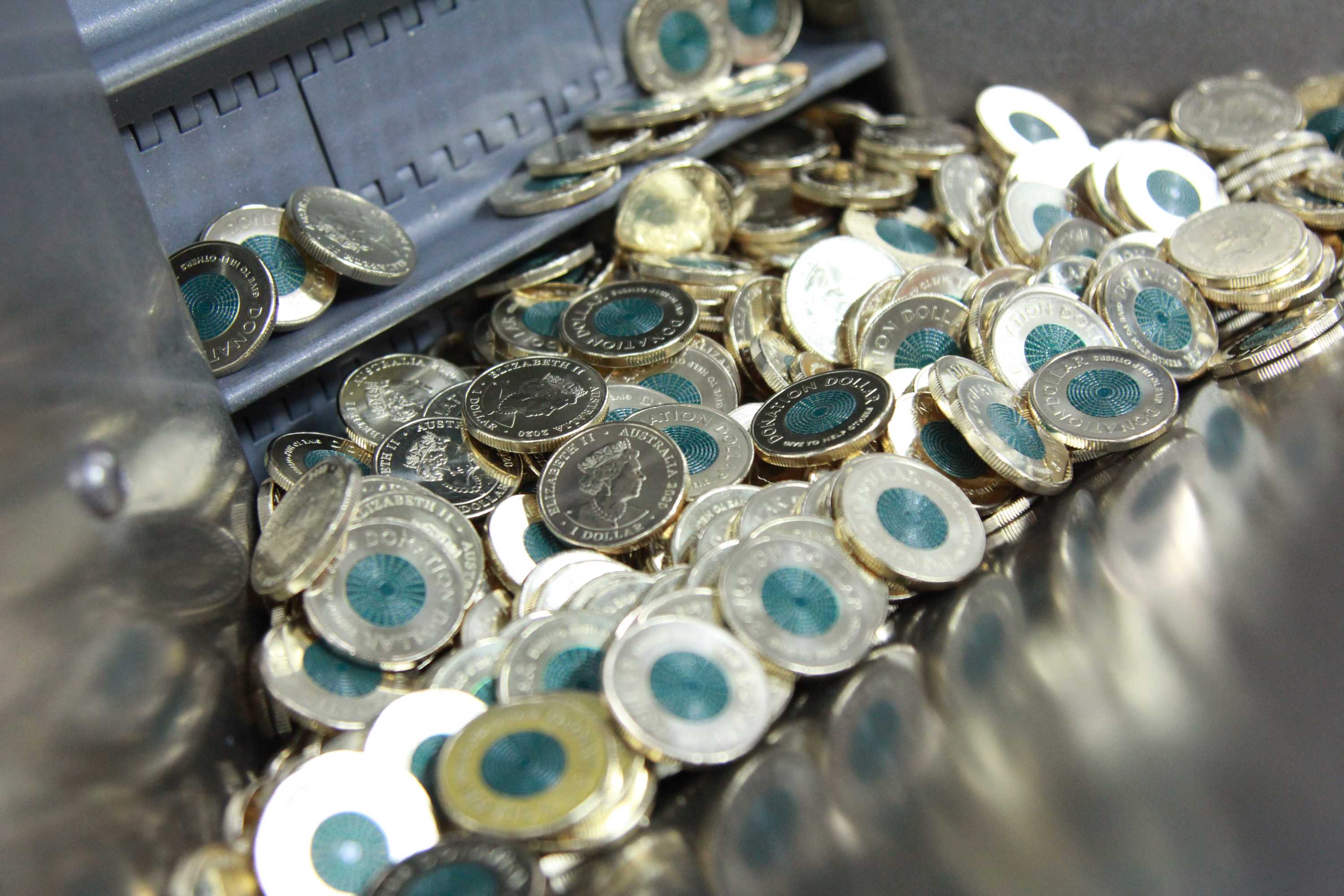 Royal Australian Mint releases 'donation dollar' coin designed to be ...